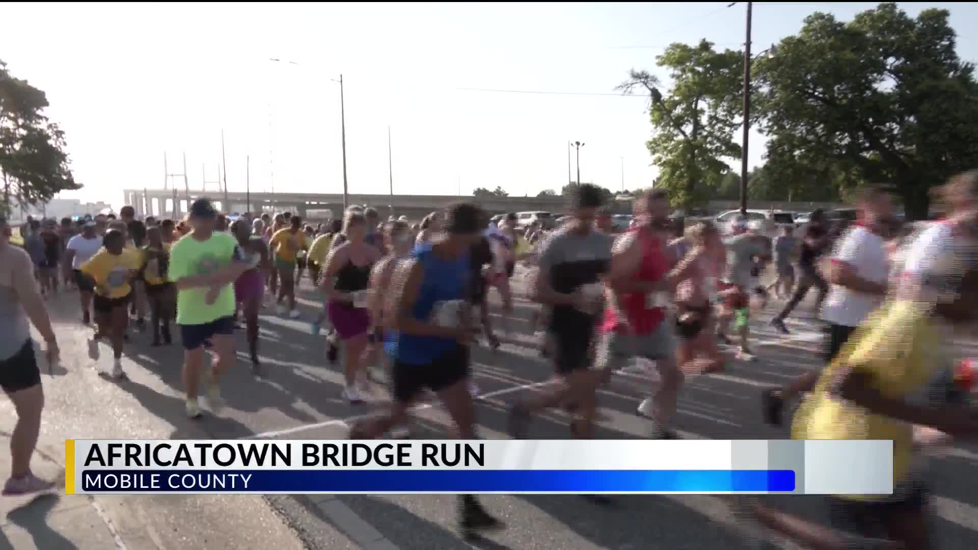 Hundreds run across iconic Mobile bridge to help Africatown