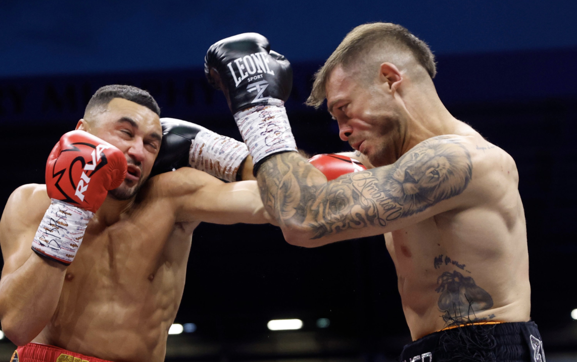 Simpson Survives Two Knockdowns To Stop Zucco