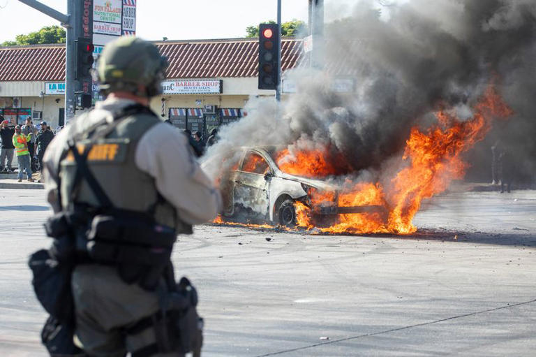 Trump bans masks from LA protests as National Guard deployed to clear ...