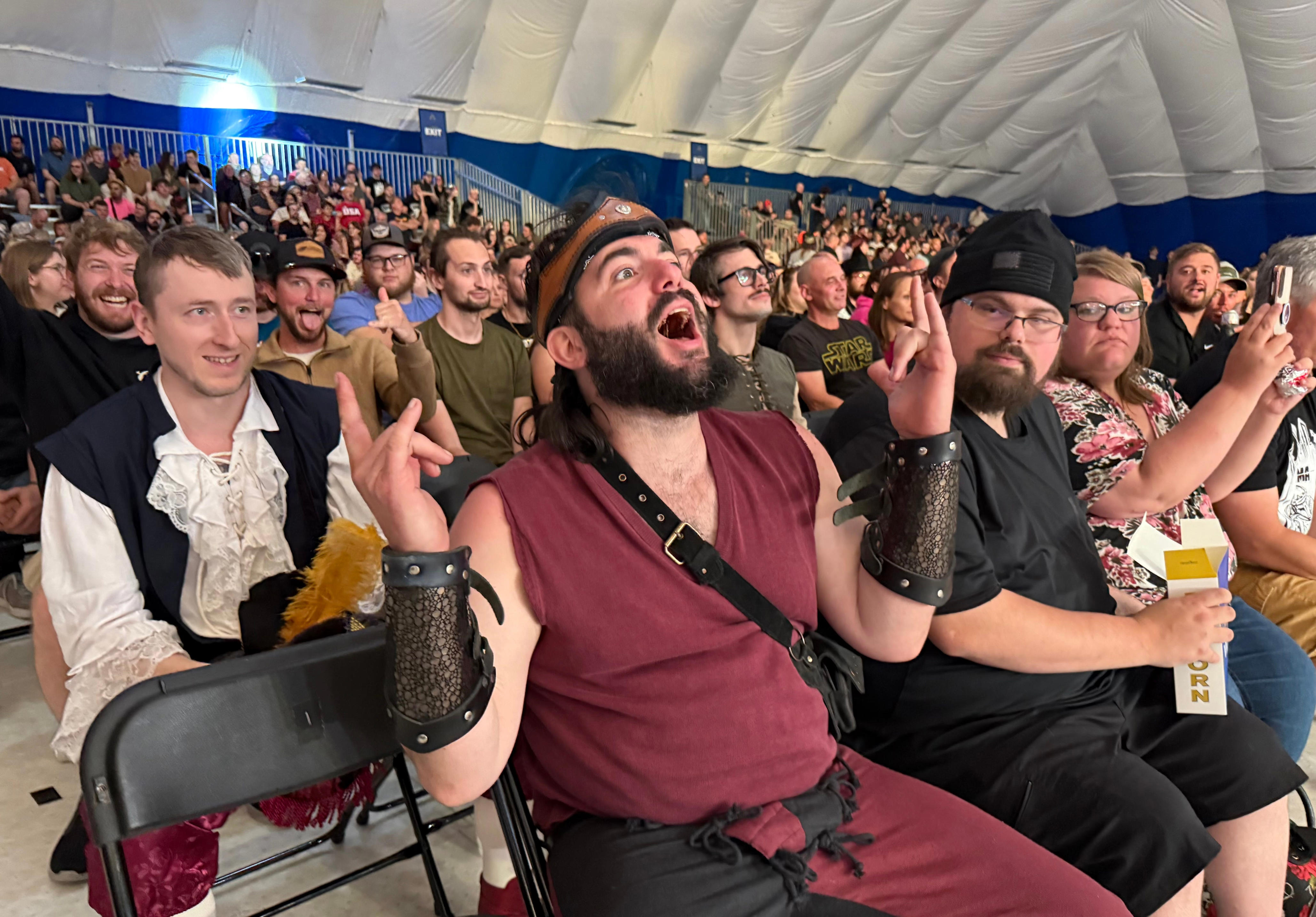 Medieval madness. Cage fights with swords entertain big crowd at Hall ...