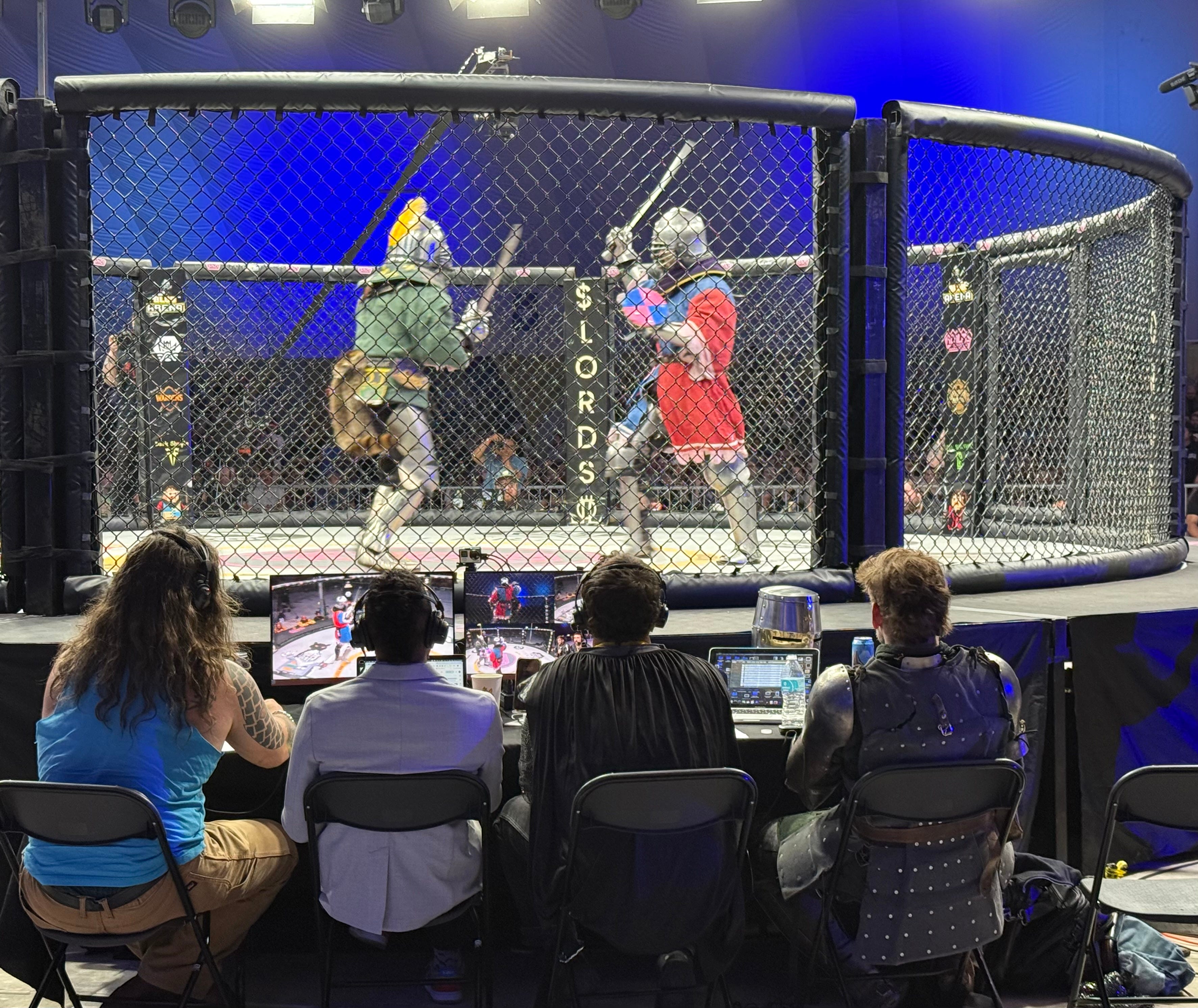 Medieval madness. Cage fights with swords entertain big crowd at Hall ...