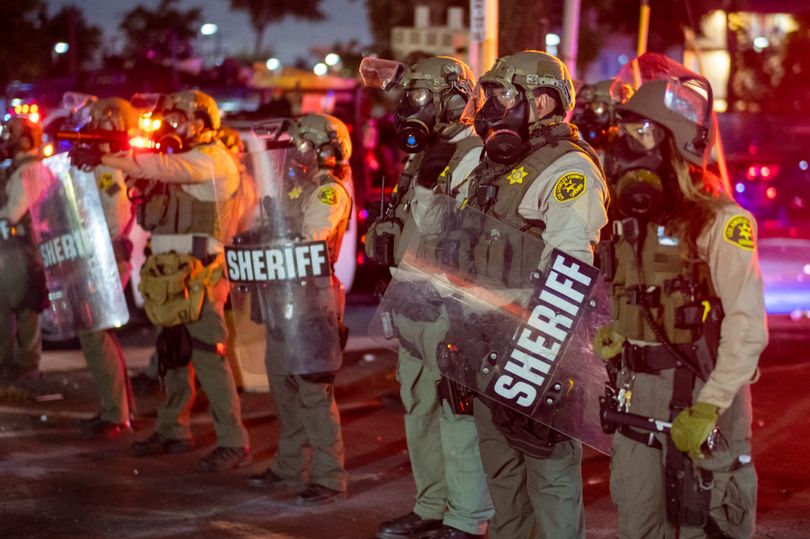 Trump bans masks from LA protests as National Guard deployed to clear ...