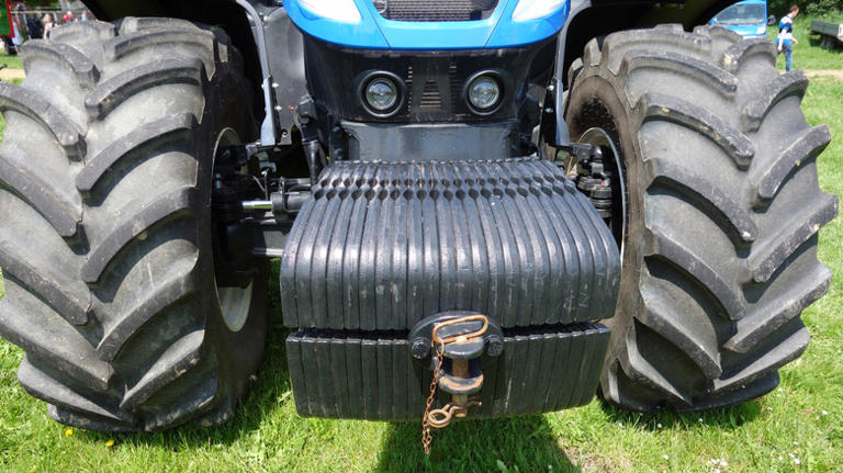 Why Do Tractors Have Weights On The Front? Here's What They're For