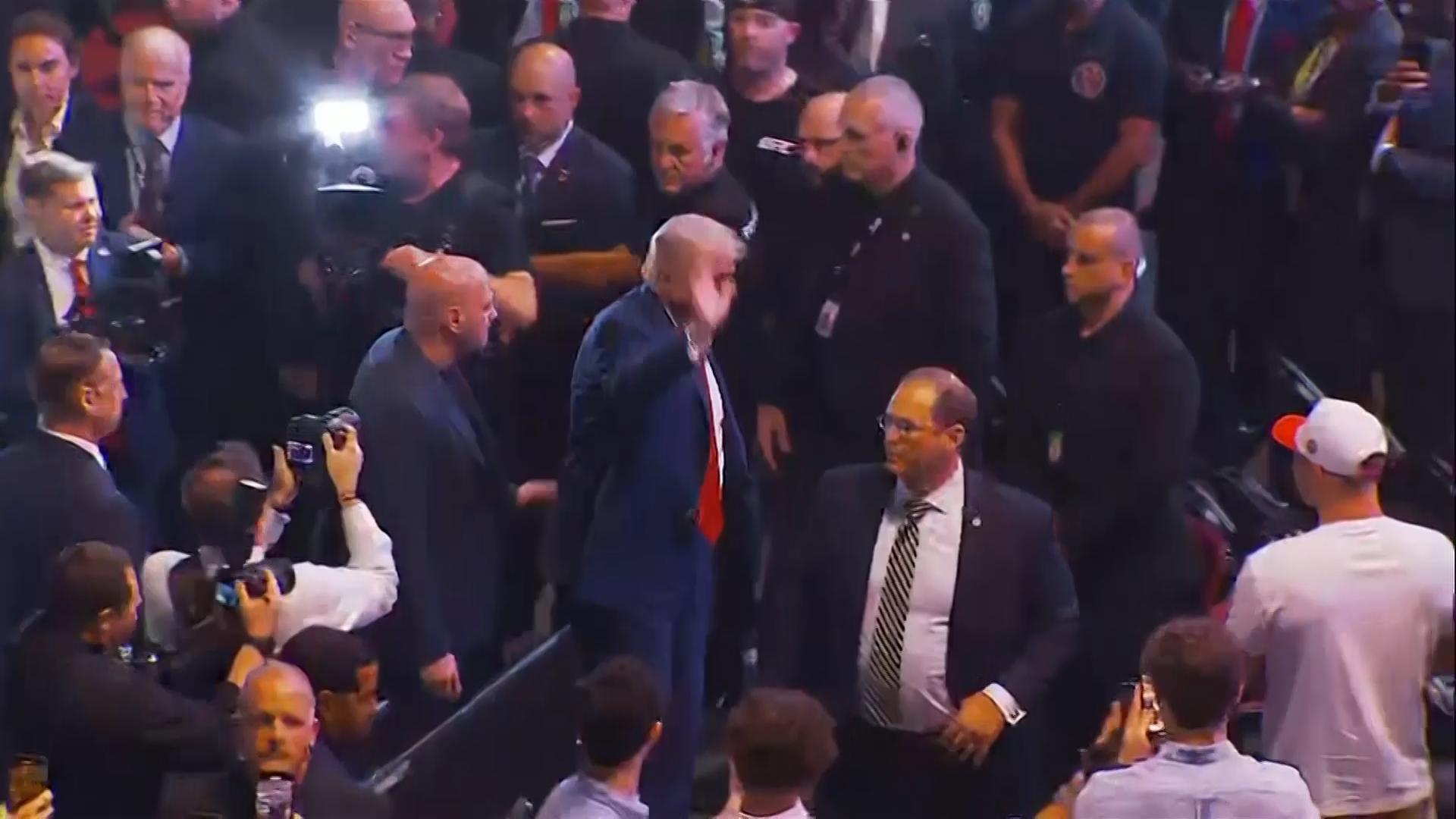 Trump looks on at UFC 316 in Newark