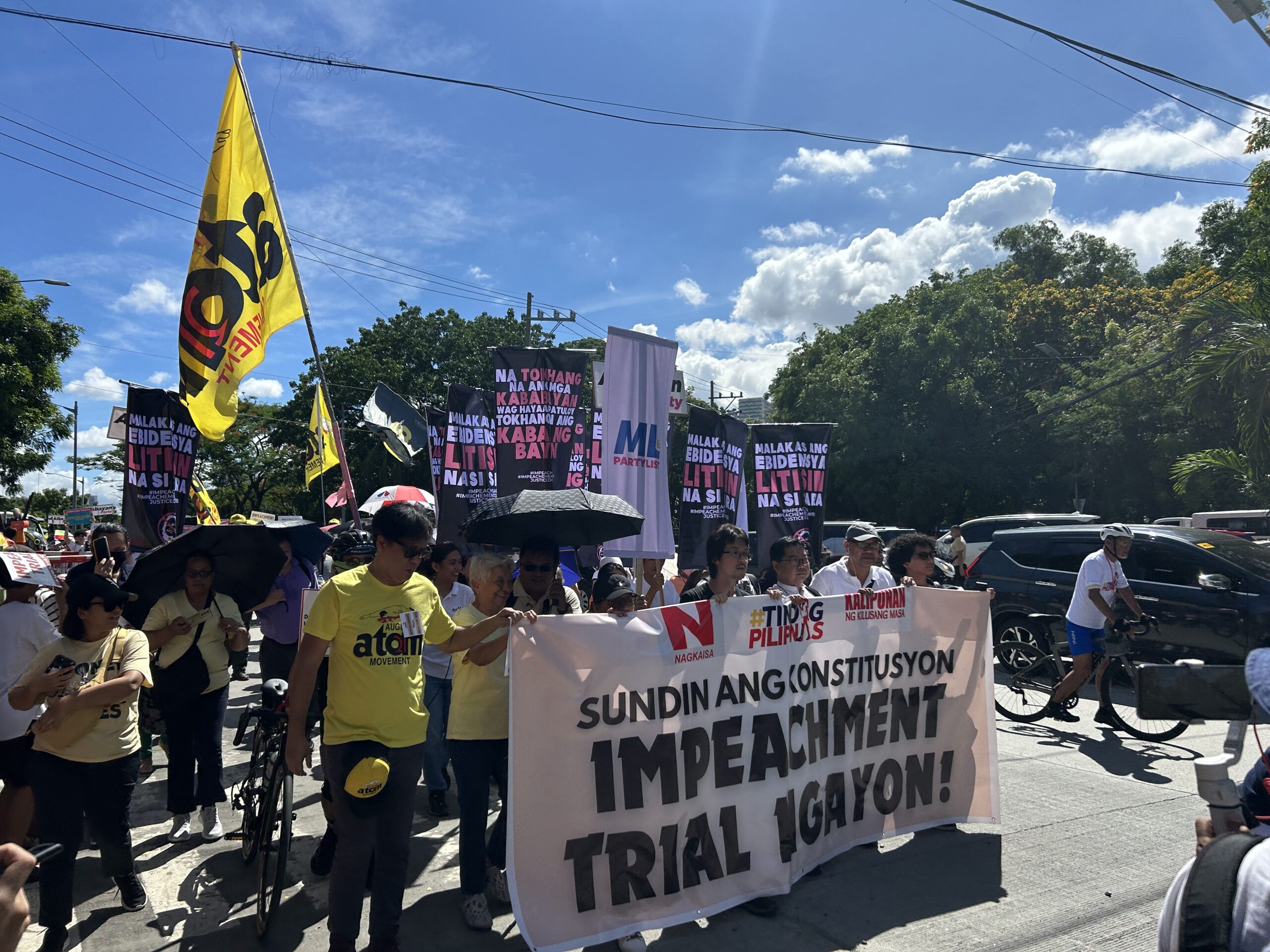 LOOK: Protesters urge Senate to proceed with Duterte impeachment trial