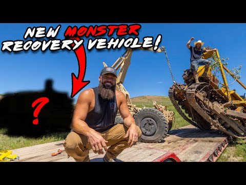 Military vehicle used to rescue stranded dozer during mission