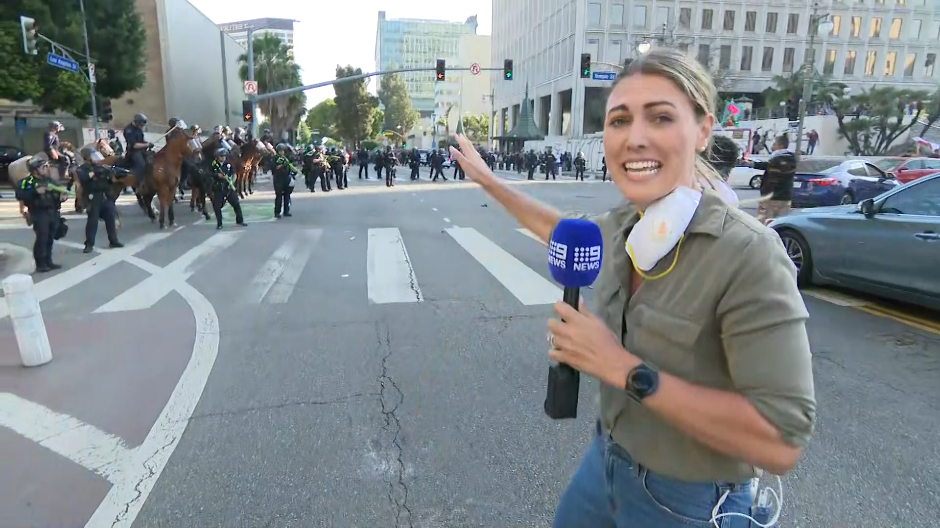 Los Angeles protests erupt as highway shut down, cars torched