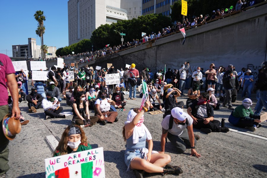 Photos: Protesters confront federal agents, set fires in downtown L.A.