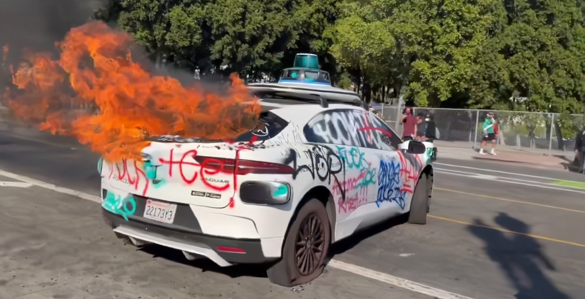 Defenseless Waymo cars have been vandalised and set on fire in the LA ...