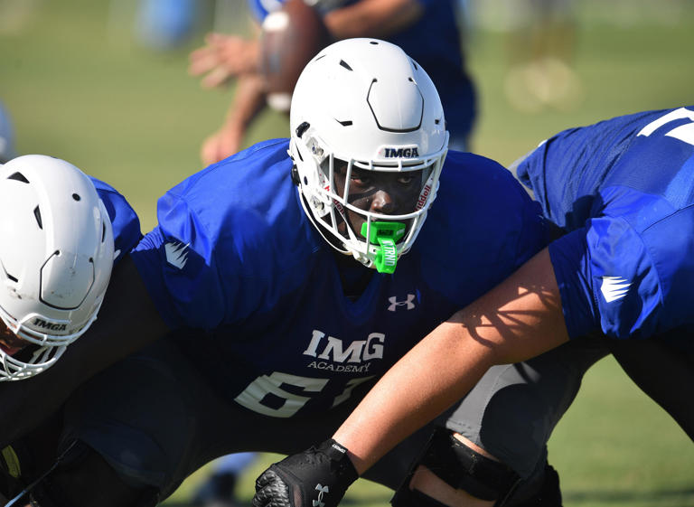 'I'm like family there': Former Trinity Catholic lineman G'nivre Carr ...