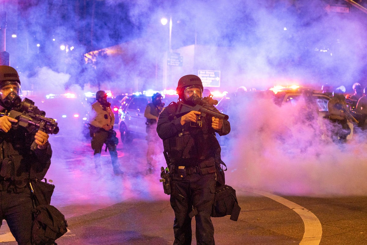 Watch: Federal agents use tear gas and flash grenades to disperse LA ...