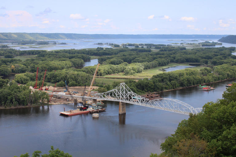 Their towns are connected by an iconic Mississippi River bridge. Its ...