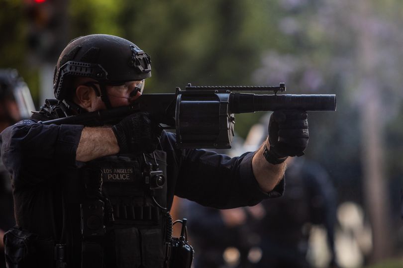 Reporter shot by LAPD during live broadcast in harrowing moment caught ...