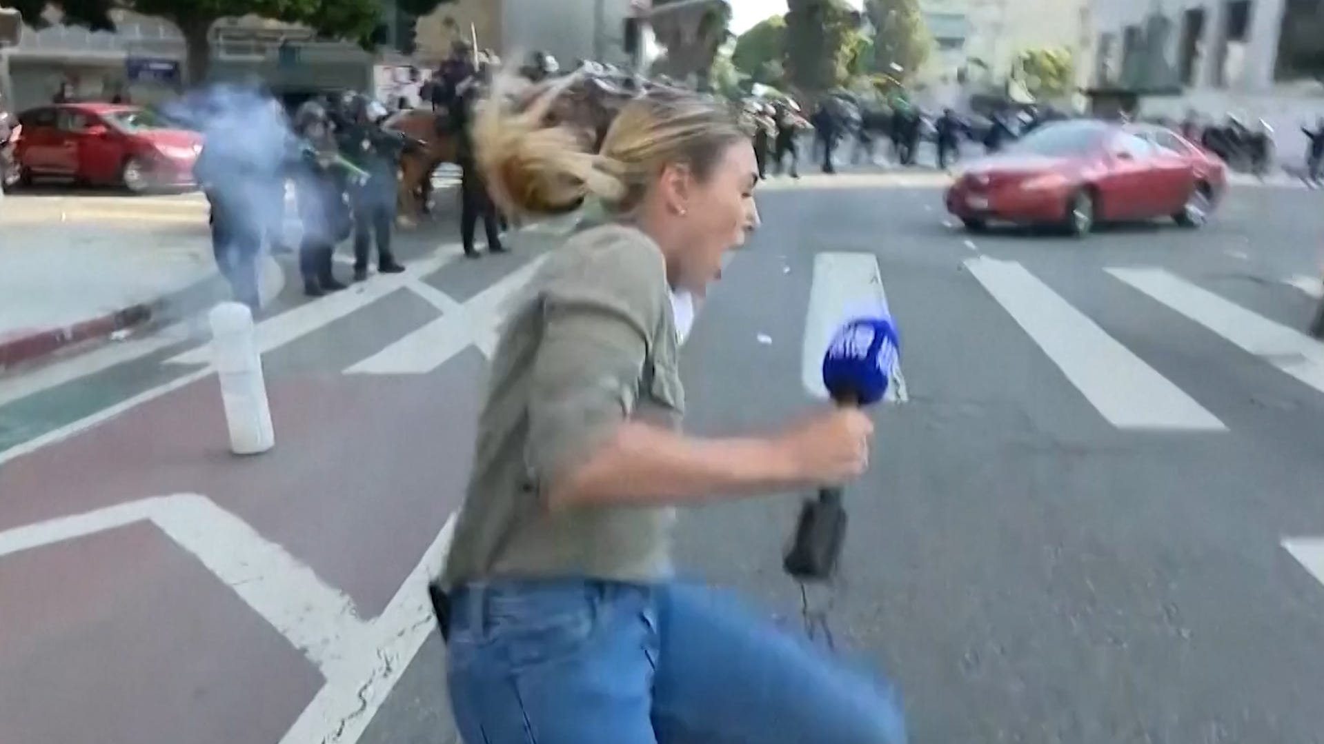 Australian journalist shot with rubber bullet while reporting on Los ...