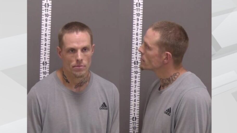 Man arrested after allegedly pulling gun on couple while driving