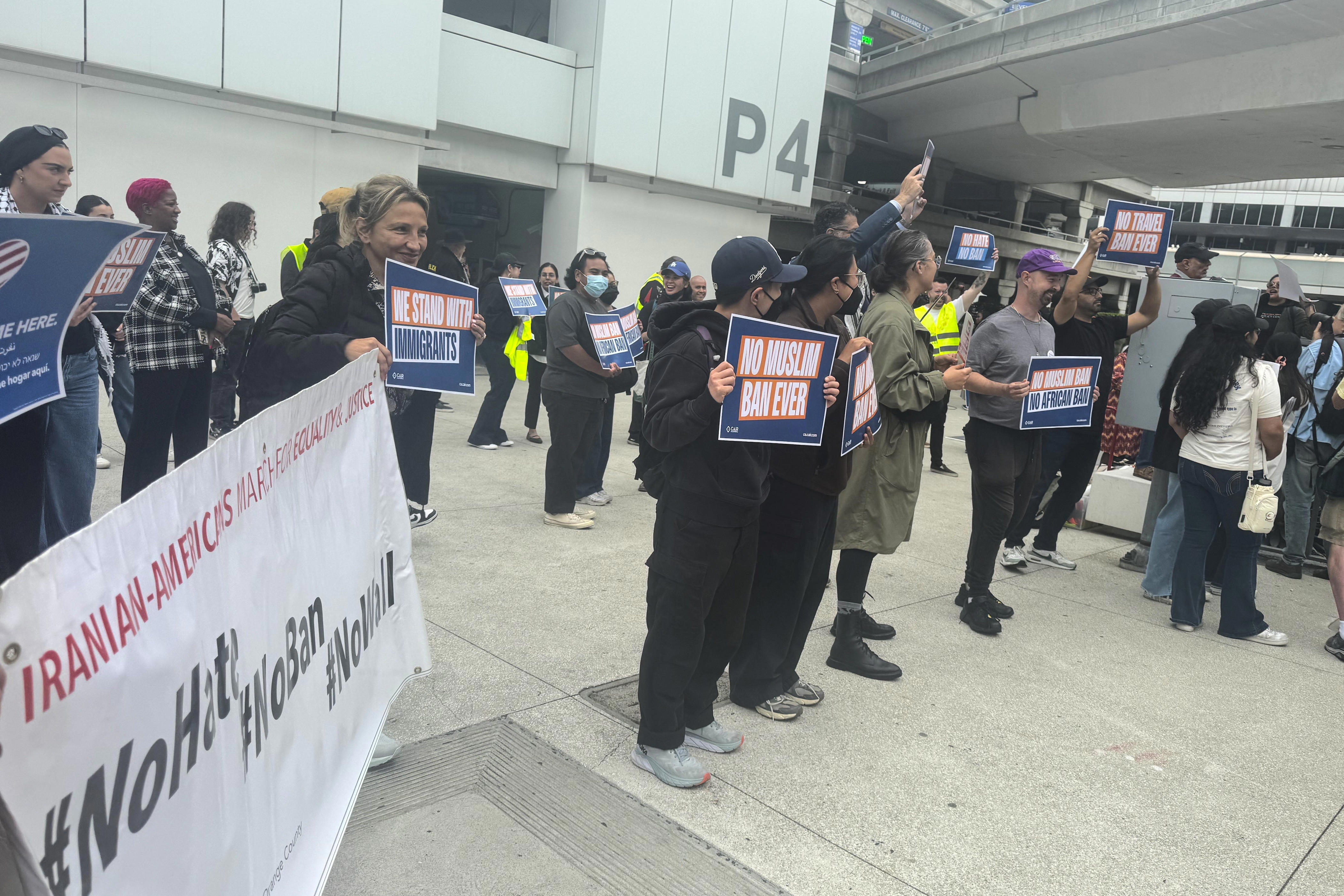 ‘No bans, no walls’: Activists at LAX protest Trump’s travel ban