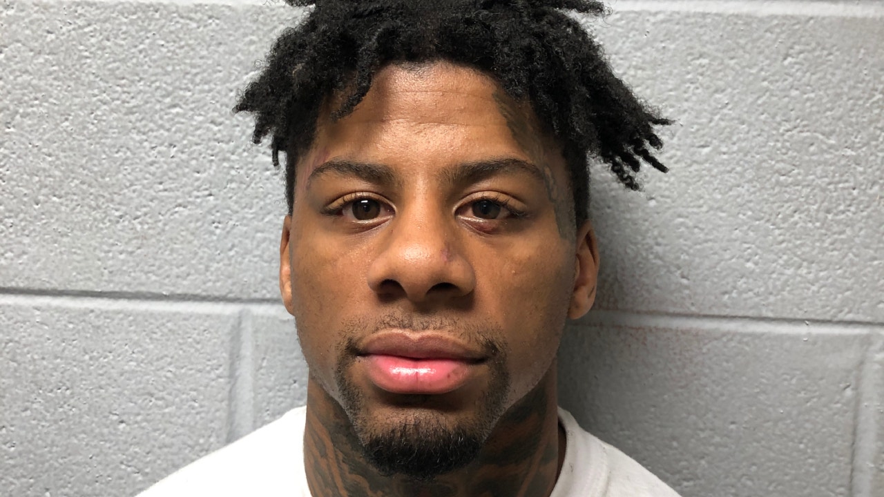 Chicago man arrested in armed robbery outside suburban home, police say