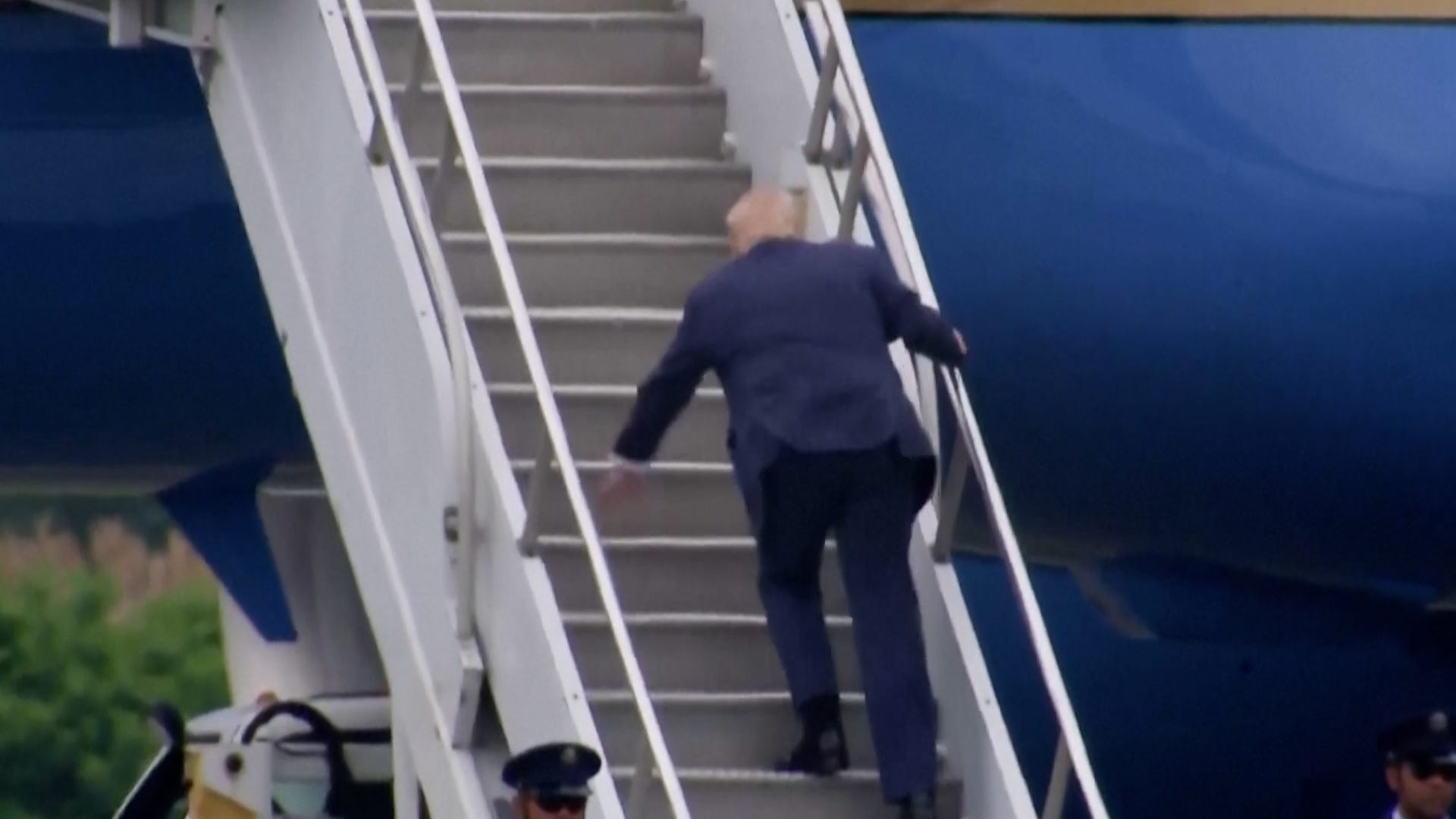Trump stumbles up the stairs to Air Force One, stoking memory of Biden ...