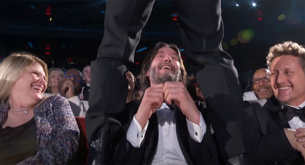 See Keanu Reeves’ hilarious reaction to being straddled by Jonathan ...