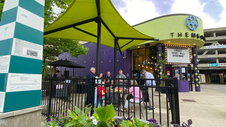 The Neon installs new sign at theater entrance