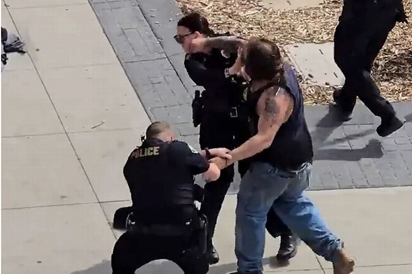 Shocking video shows man punching three North Dakota cops in wild ...