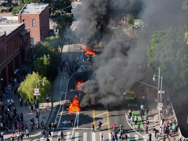 In photos: Trump deploys National Guard to LA as ICE raid protests ...
