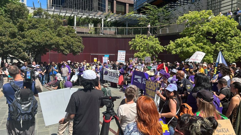 Seattle marches in solidarity against ICE raids, demands release of ...
