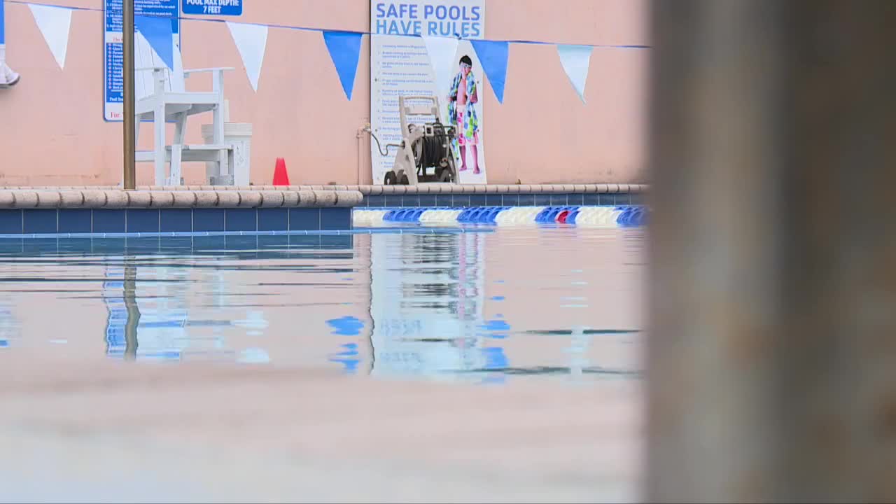 Mother charged with neglect after 4-year-old nearly drowns in pool in ...