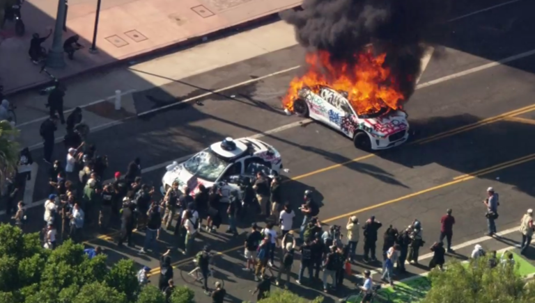 Los Angeles anti-ICE protesters clash with police, set fires downtown ...