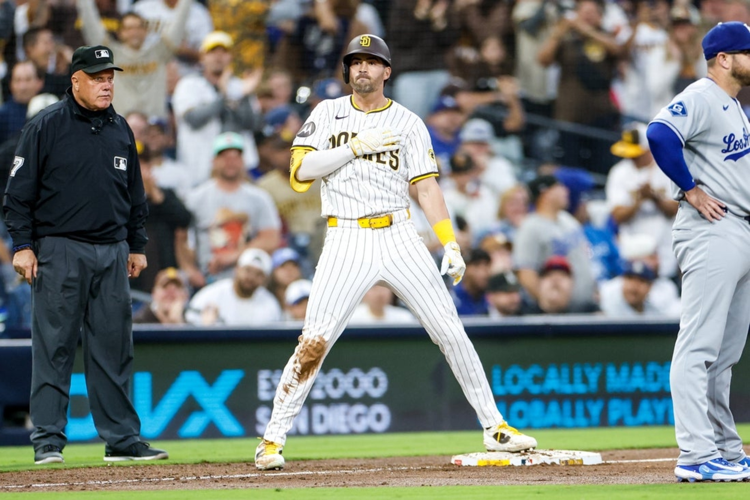 Dodgers score twice in 10th inning, hold off Padres