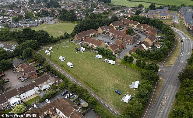 Idyllic town besieged by travellers after three encampments set up in ...