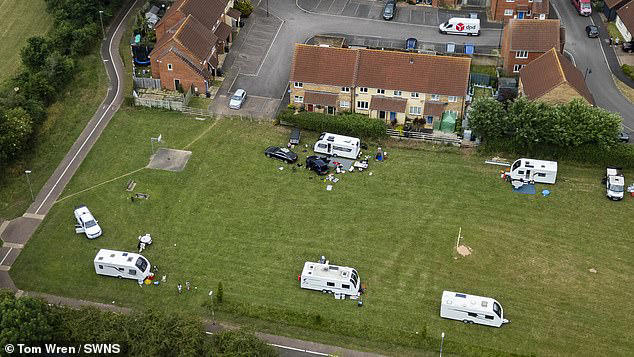 Idyllic town besieged by travellers after three encampments set up in ...