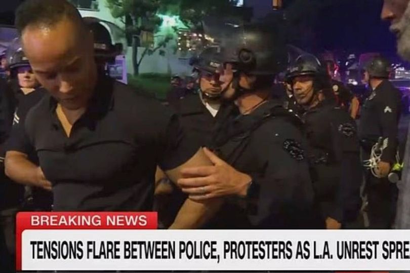 Watch as CNN journalist gets detained by cops during live report from ...