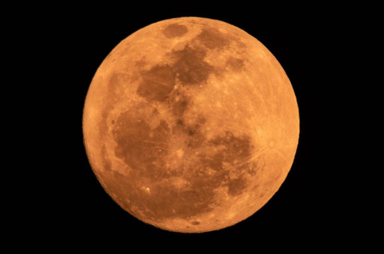 Rare low-hanging Strawberry Moon will appear more red than usual