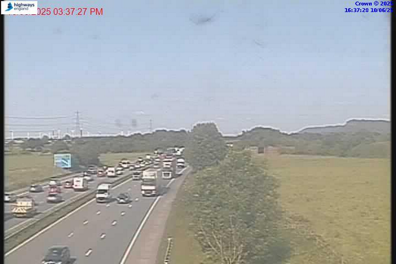 M56 closed after three-car crash