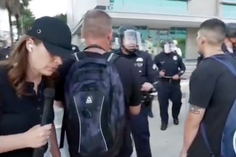 CNN reporter gets roughed up as she's caught in crosshairs at LA riots