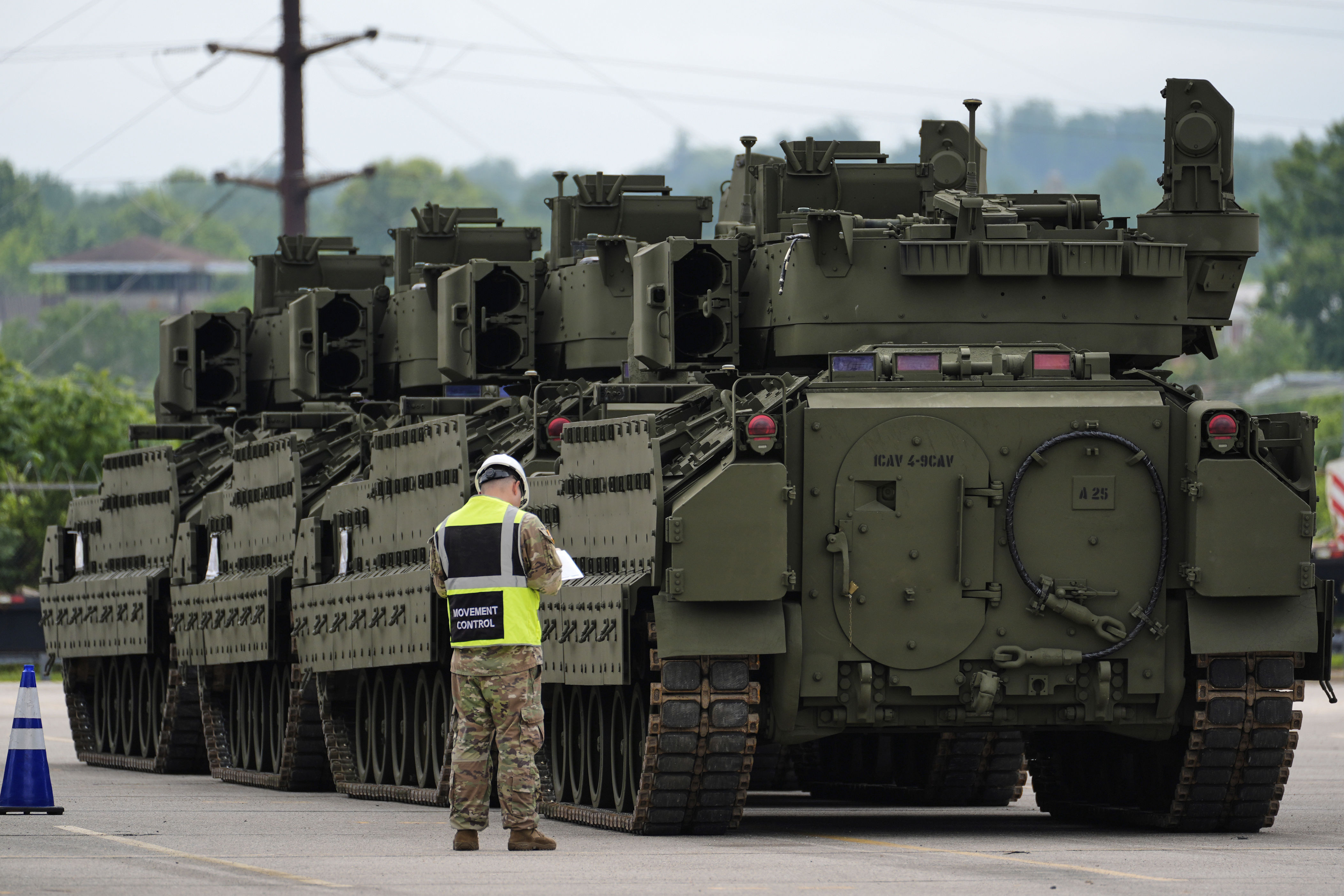 Thousands of troops, dozens of tanks, two mules and a dog: What to ...