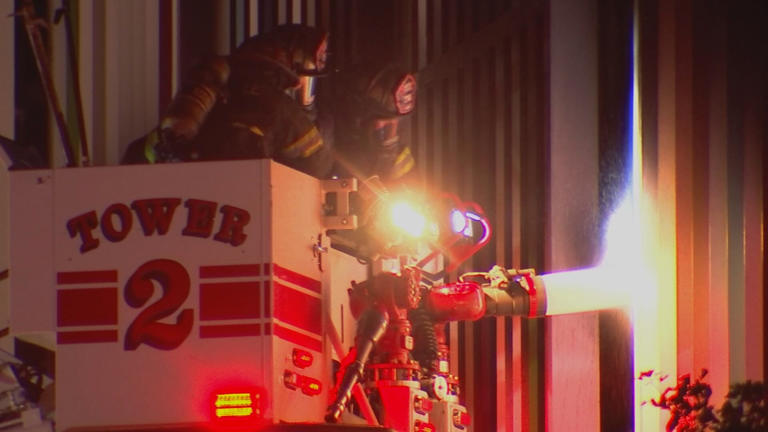 Massive fire, partial collapse trap cars in downtown library parking garage