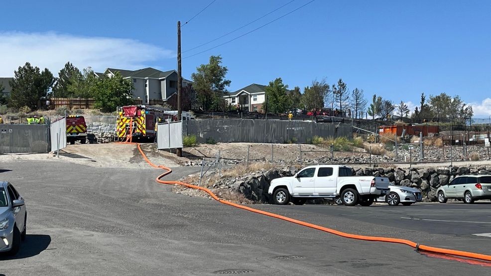 Crews respond to brush fire with structures threatened near UNR