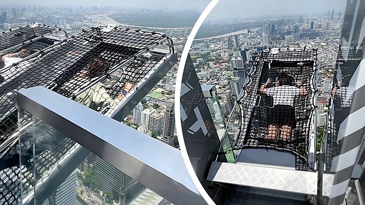 Tourist braves world's first outdoor tilt ride 1,000ft above Bangkok
