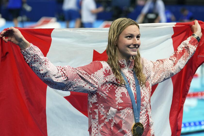 Canadian teenager Summer McIntosh sets her third world swimming record ...