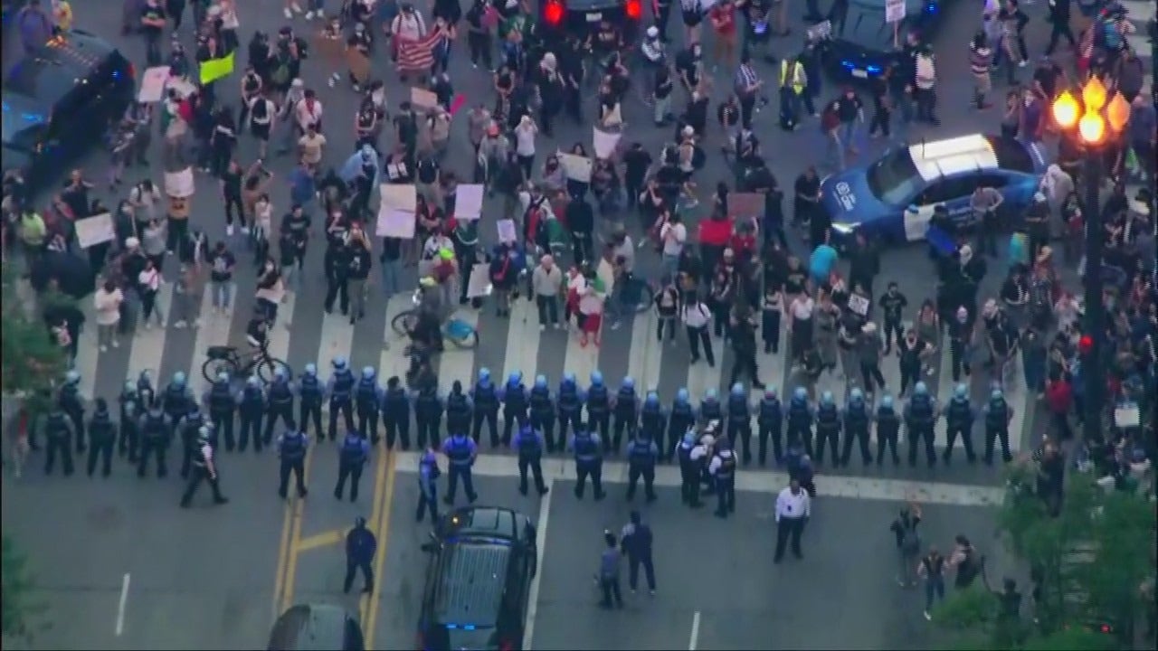 Chicago anti-ICE protests prompt street closures while car speeds into ...
