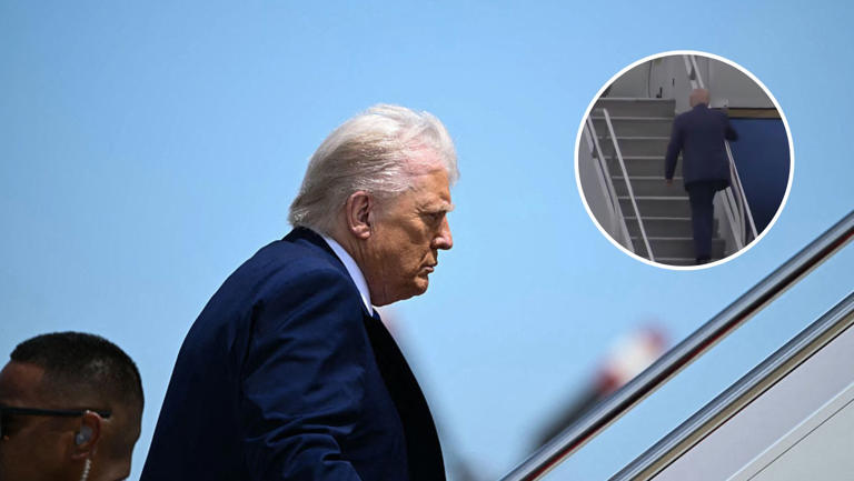 Trump stumbles down the stairs of Air Force One