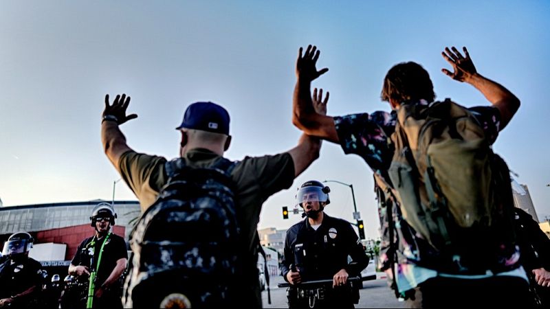 LA imposes downtown curfew as Newsom criticises Trump