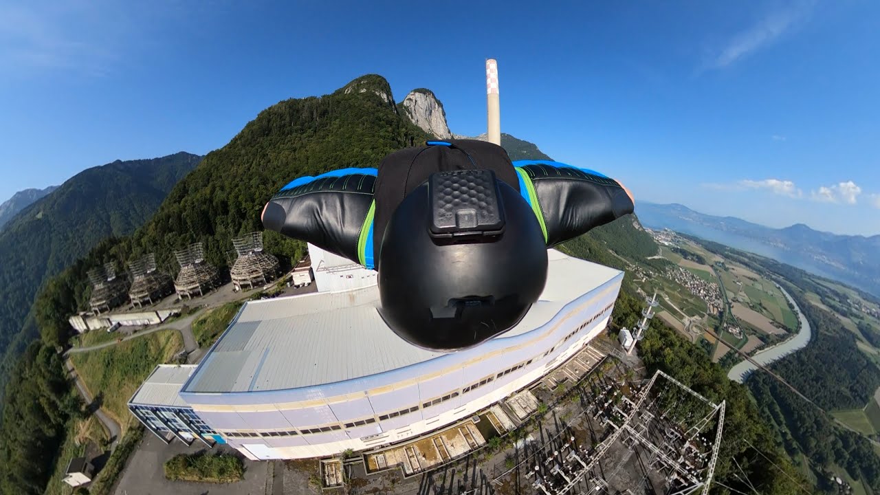 Wingsuit BASE Jump over power plant | 360 VR