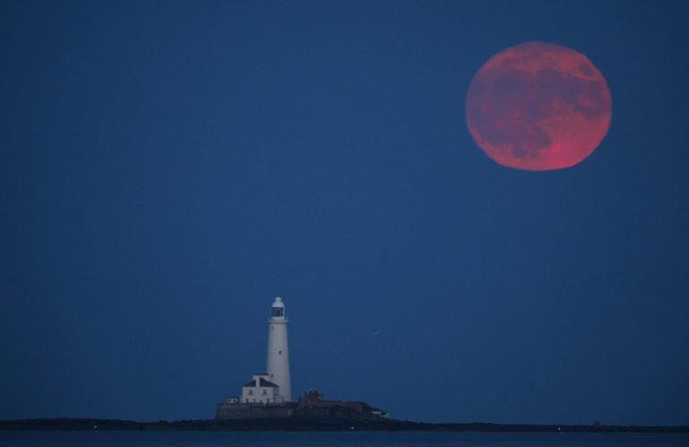 Strawberry Moon: Best photos of rare night sky phenomenon visible this week