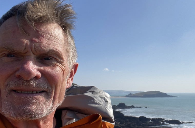 Retired banker hits halfway mark in bid to run 200 marathons around coast