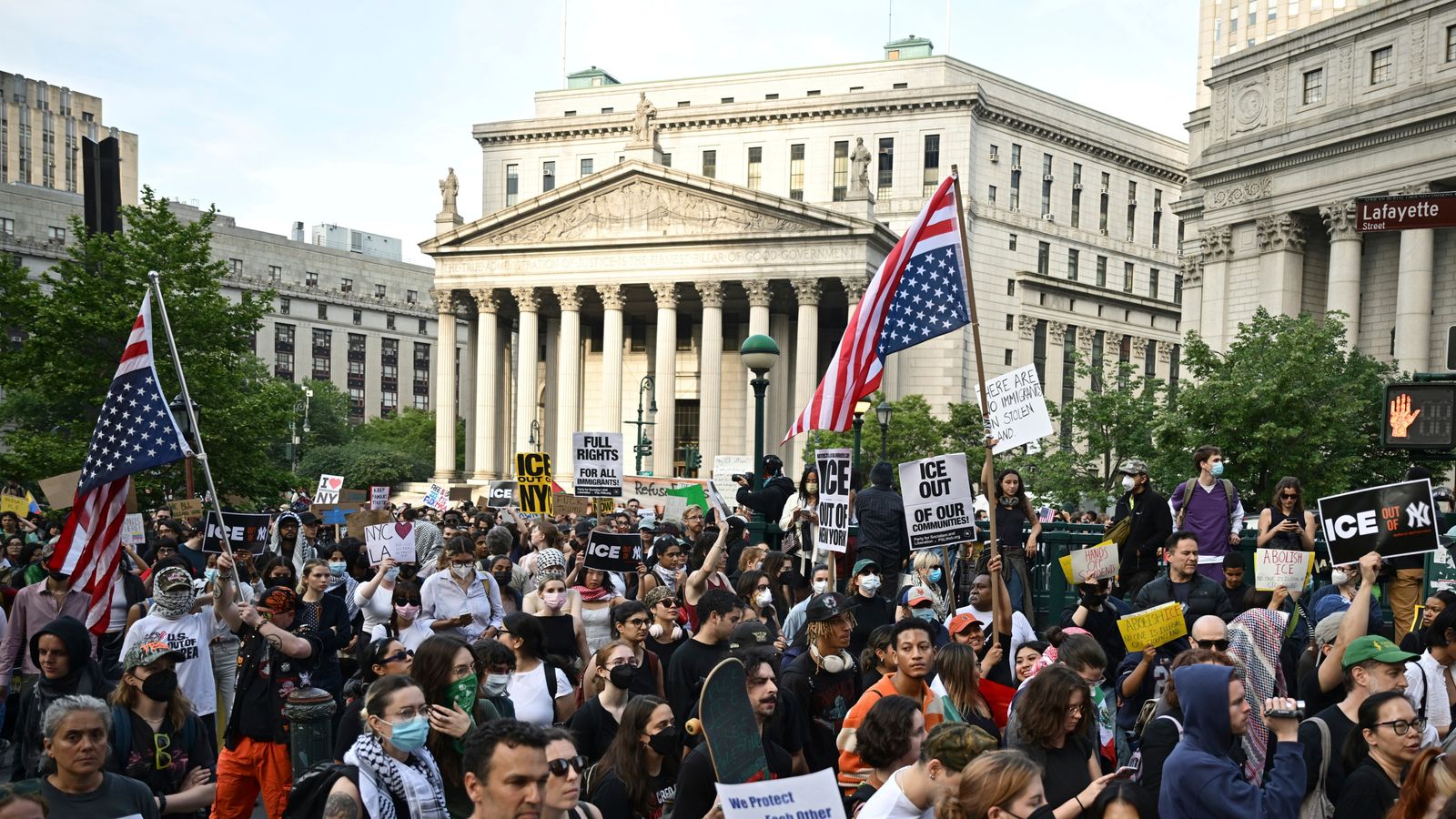 Riot police enforce LA curfew as protests spread across US