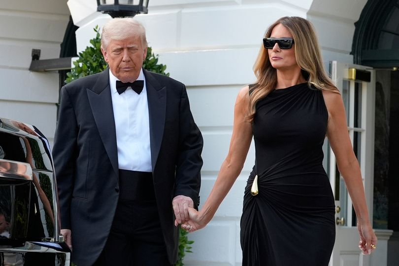 Melania covers face with shades in rare red carpet appearance with ...