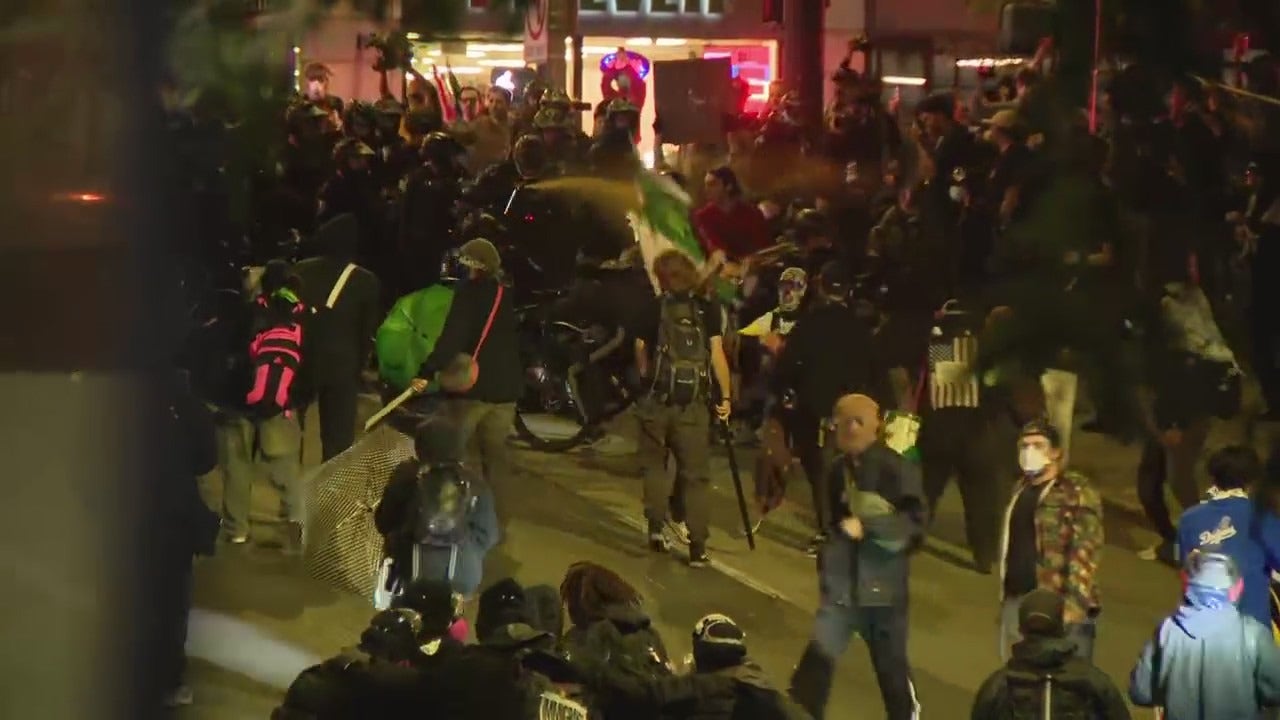 Seattle police disperse 'ICE OUT' protesters after fire breaks out downtown